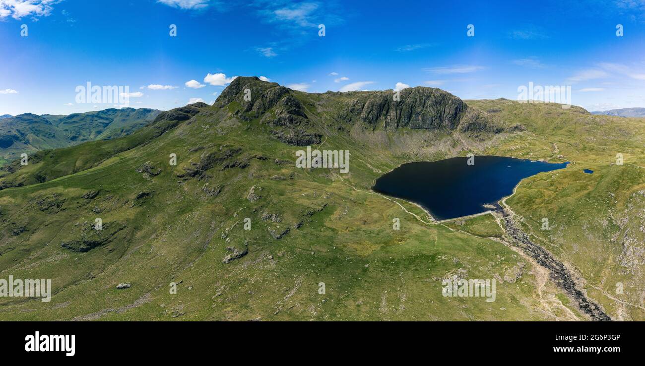 Aerial view of Stickle Tarn lake, the Lake District, Great Langdale ...