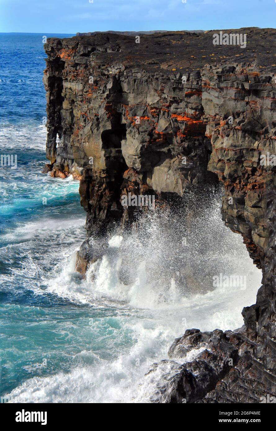 Arches have formed under cliffs edge along the Hawaii Volcanoes ...