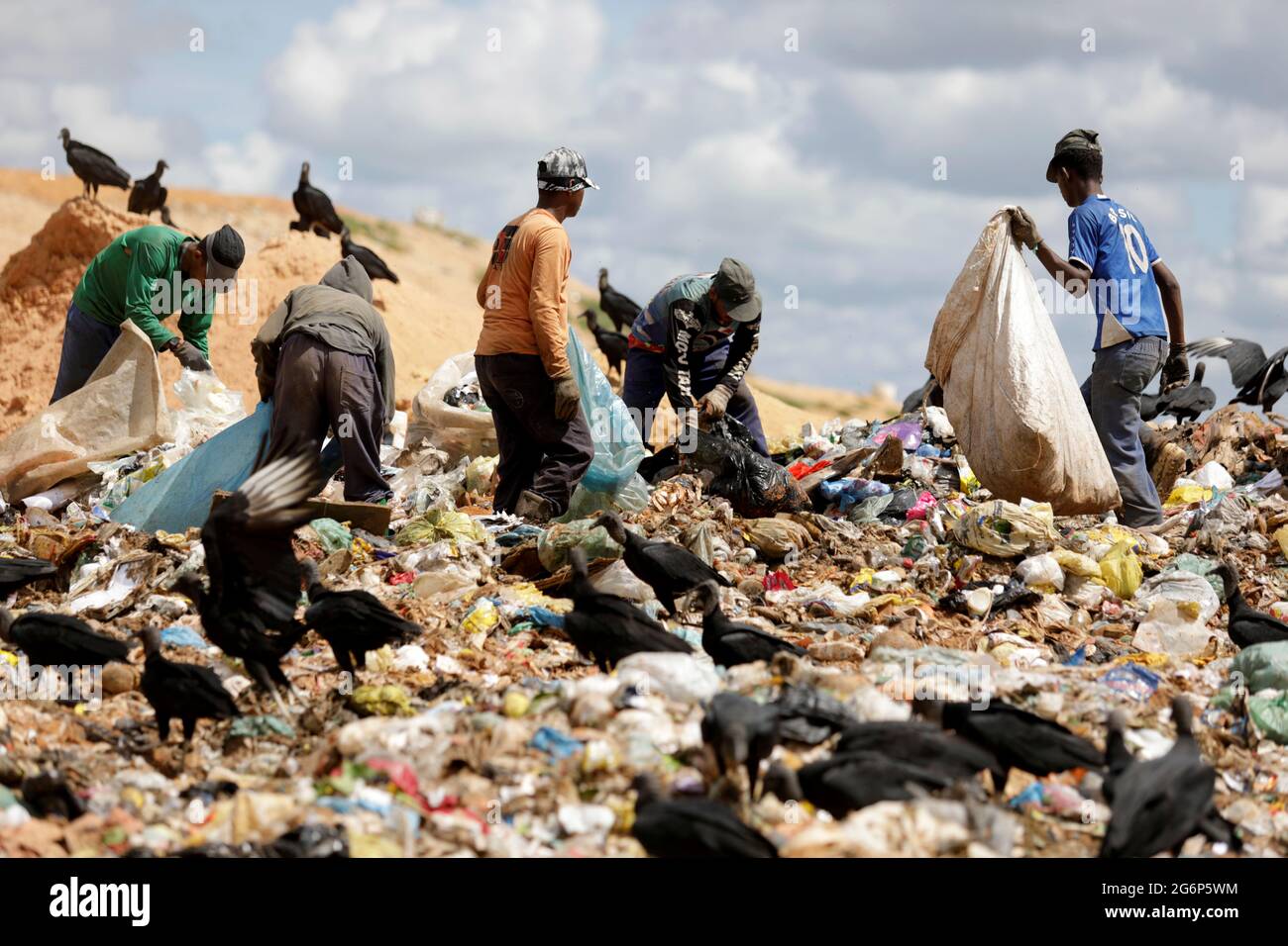 alagoinhas, bahia, brazil - may 2, 2019: people are seen rummaging ...