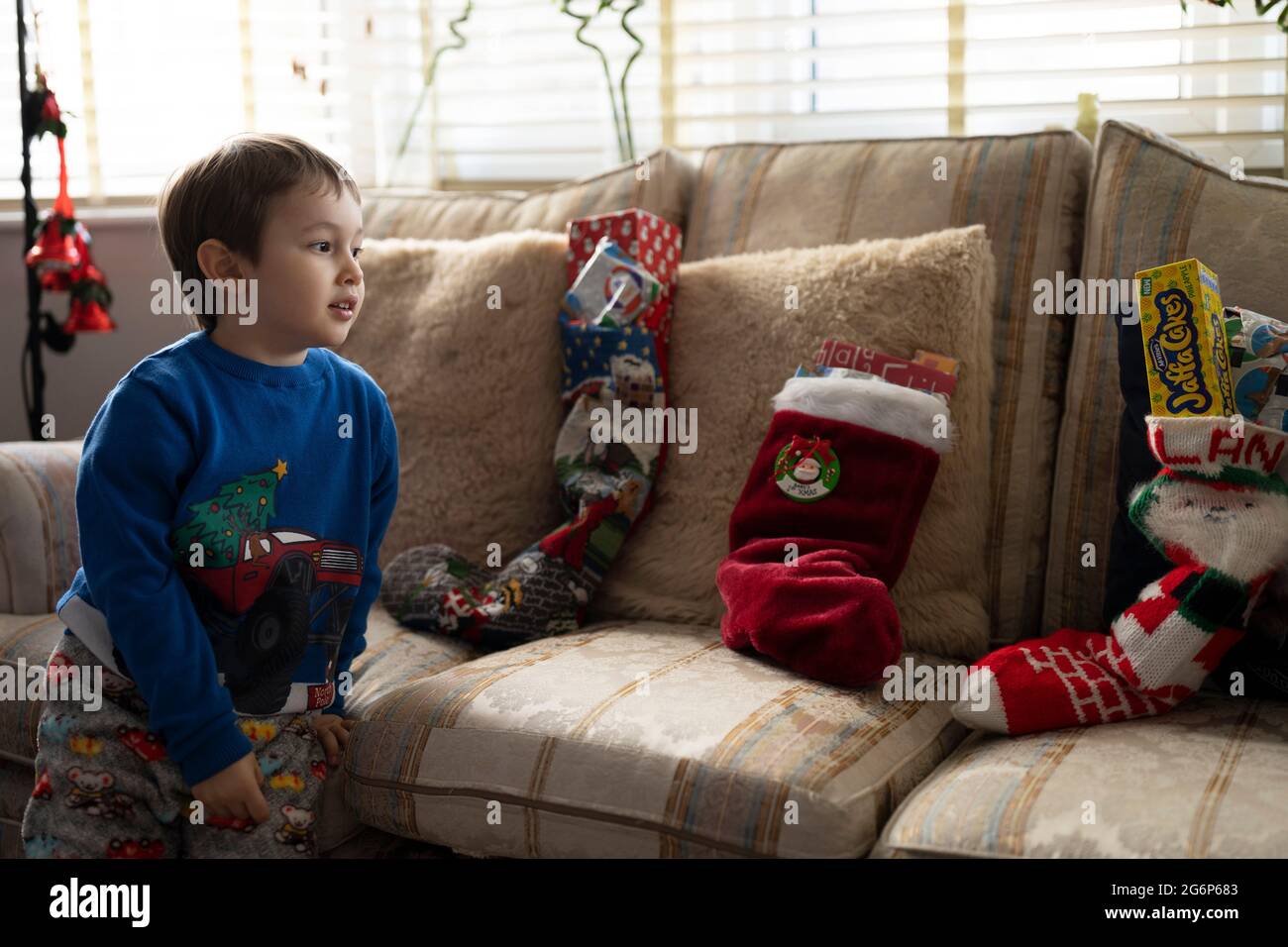 A little boy about to open his Christmas stocking Stock Photo - Alamy