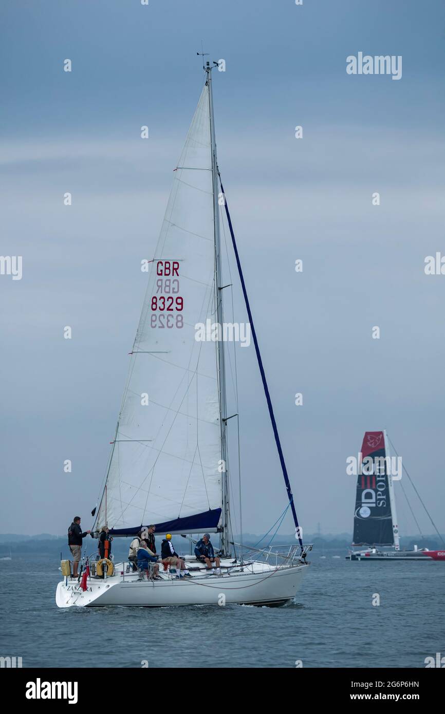 Sailing boat and trimaran on the water in the Round The Isle of Wight ...