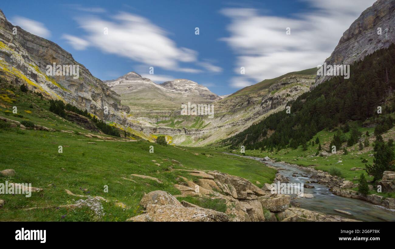 Long exposure of Monte Perdido and Ordesa valley with river in the ...