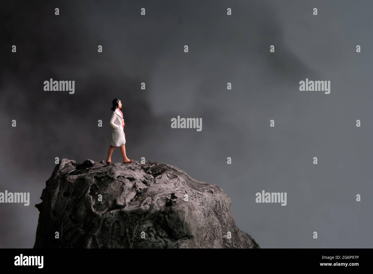 Miniature people toy figure photography. Superhero doctor concept. A ...