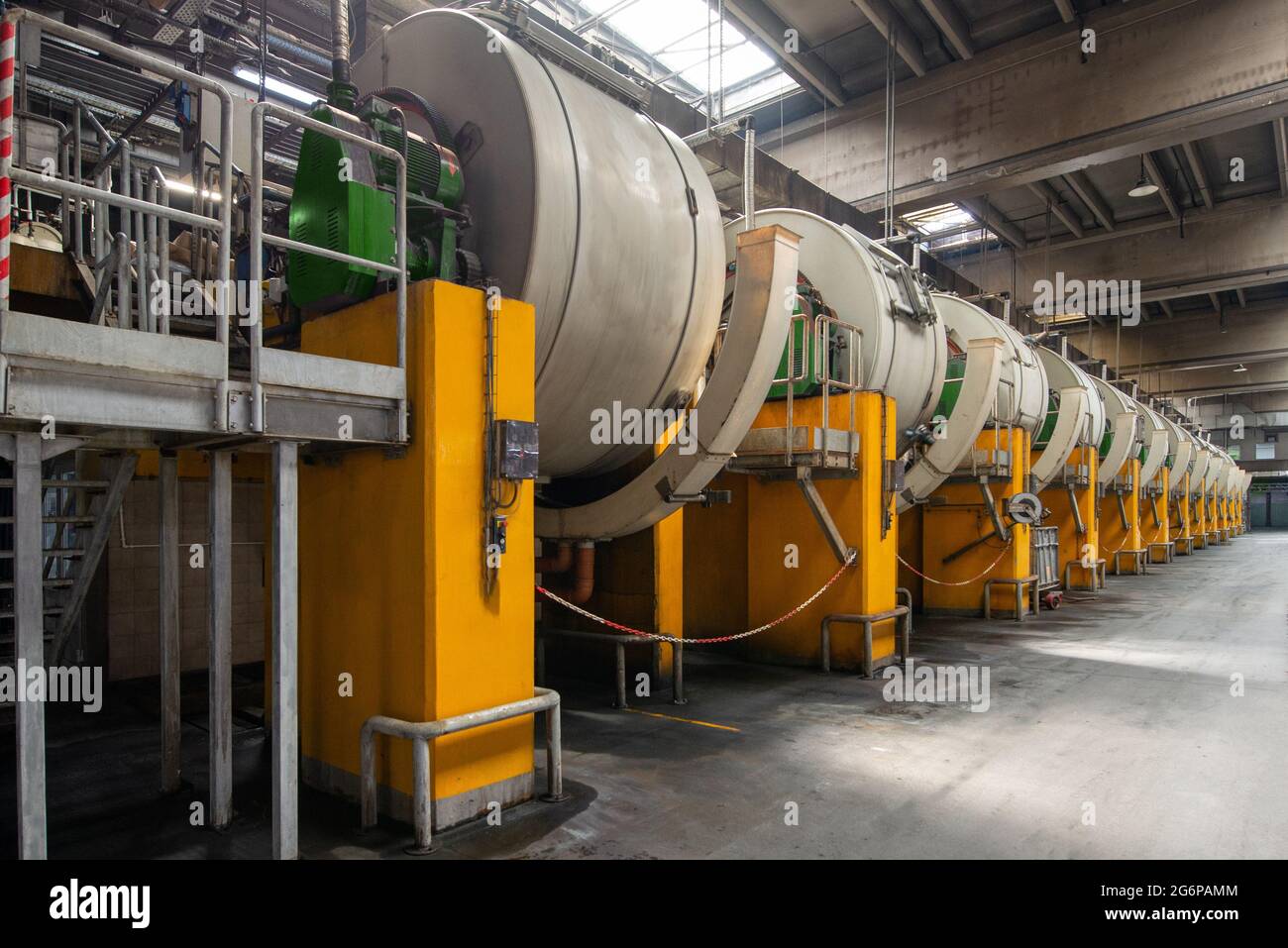 Tannery. Large metal barrels for leather dyeing Stock Photo - Alamy