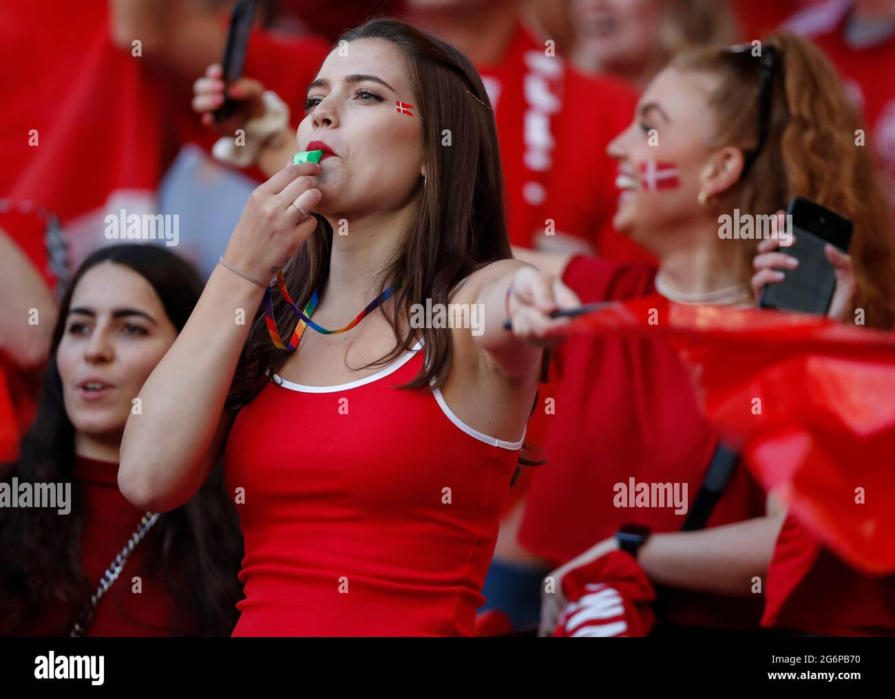 London, Britain. 7th July, 2021. A fan of Denmark cheers for the team ...
