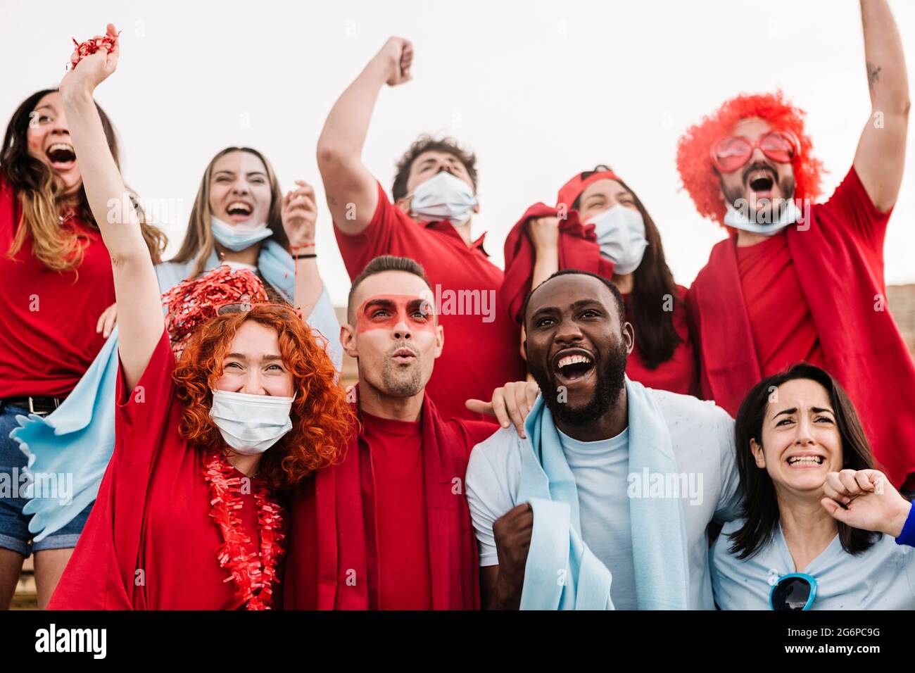Rival sport fans screaming while supporting their teams at stadium ...