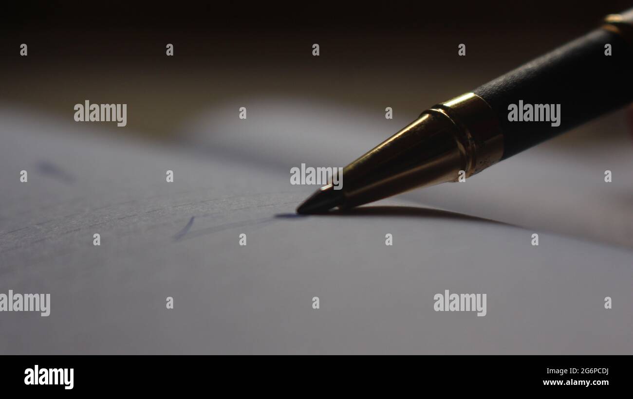 Macro picture of point of a old ink pen with a blurry background Stock ...