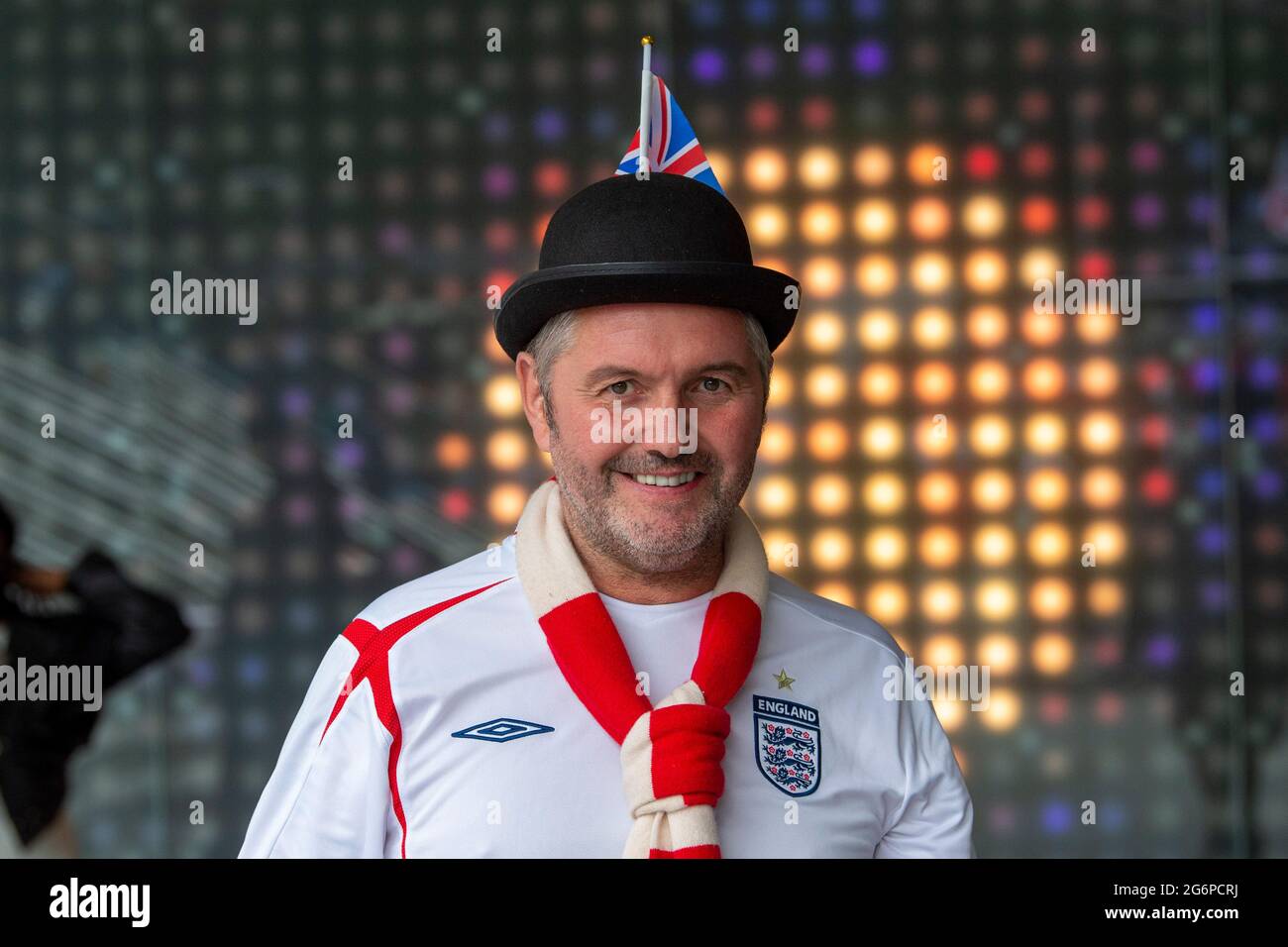 An England fan with a Bowler hat on arrives at Wembley Stadium ahead of ...