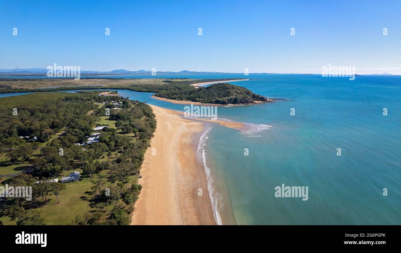 Aerial landscape of a beach and beachfront community and out over the ...