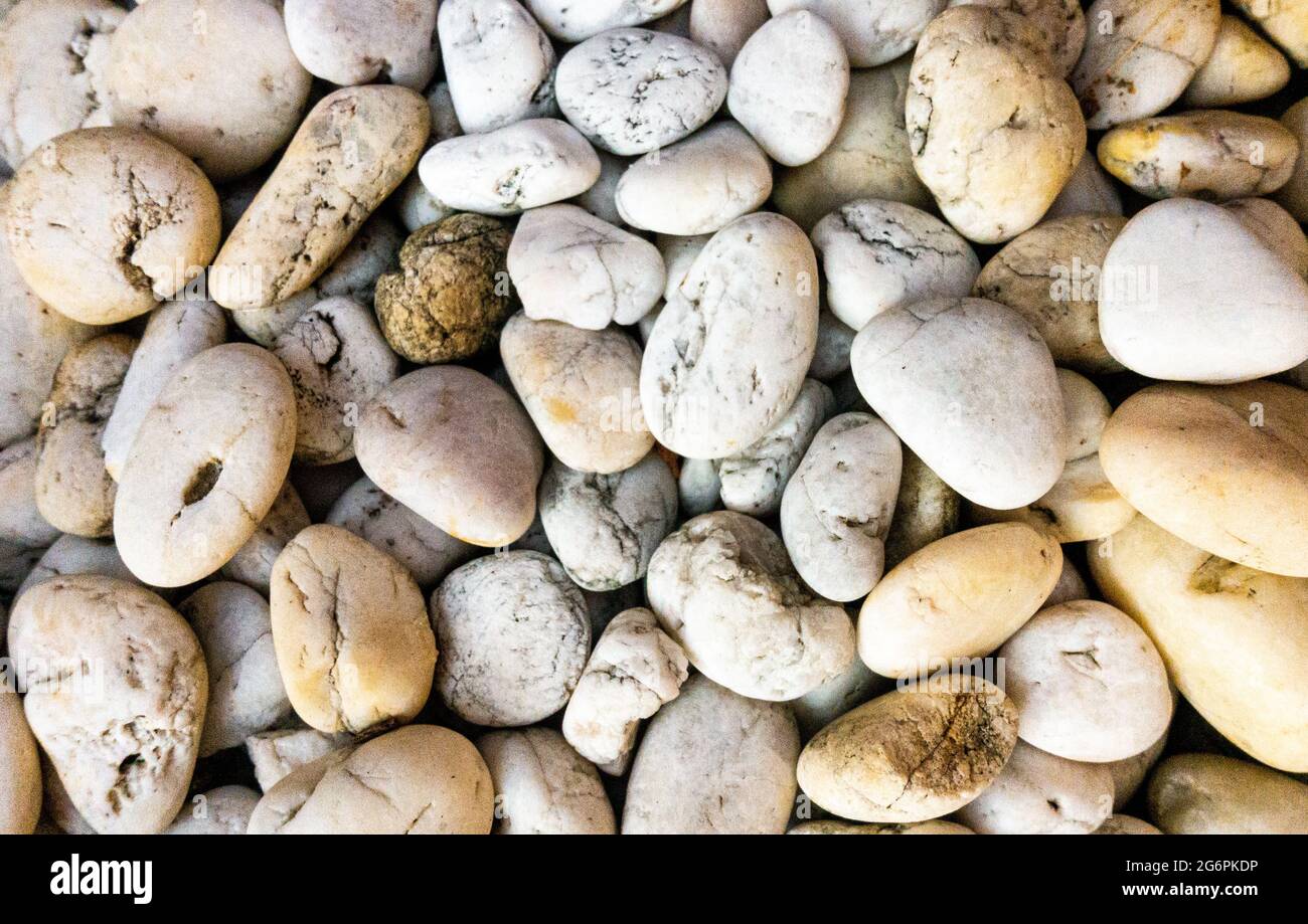 Stone, in small size, most in light earth tone color. Close up. Can be ...