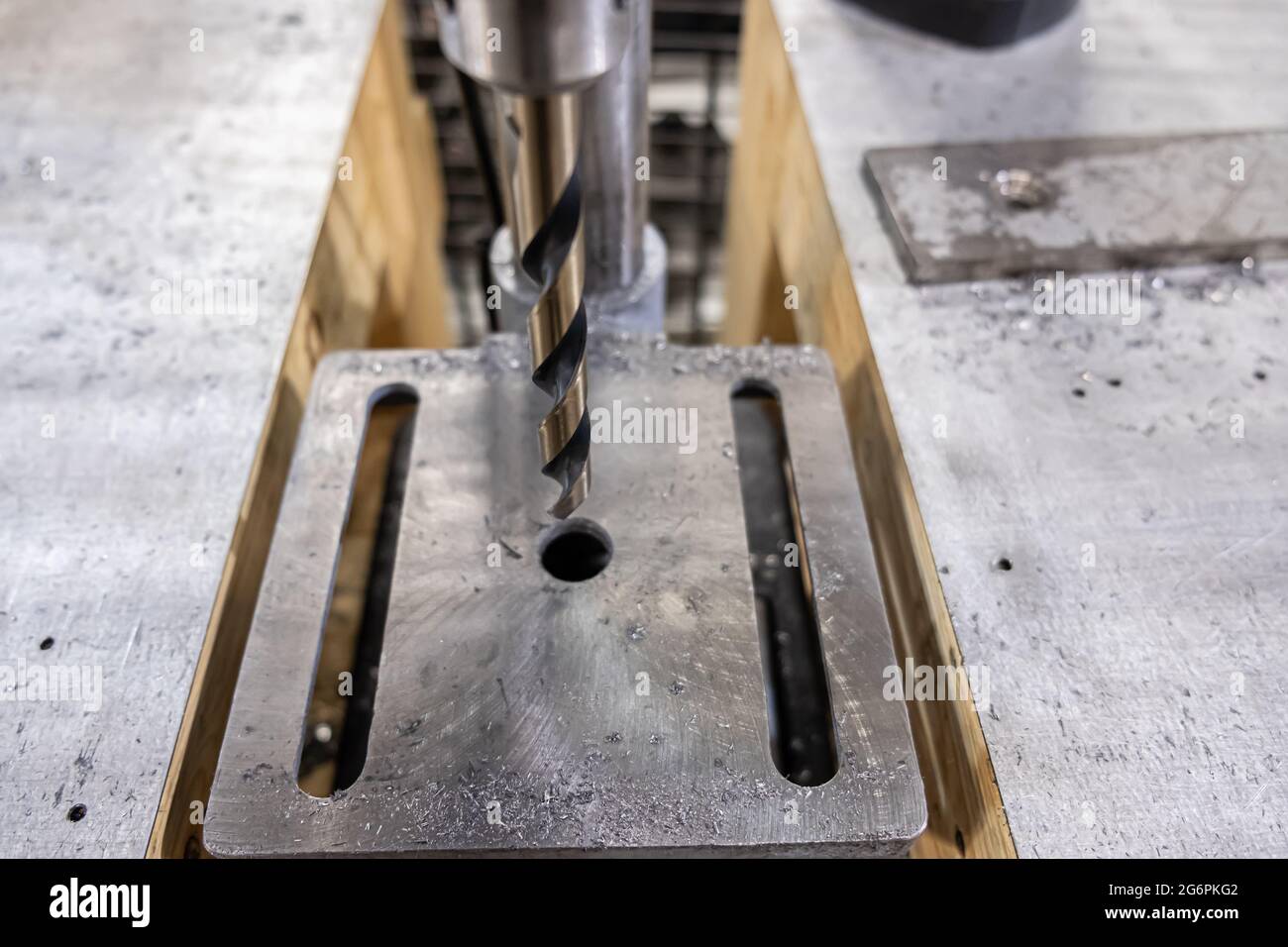 Large industrial drill bit machine on factory workshop floor Stock ...