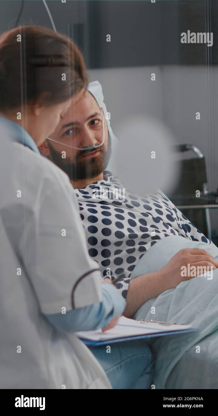 Professional doctors discussing sickness symptom hi-res stock ...