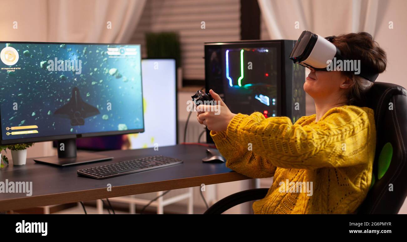 Pro cyber sport gamer relaxing playing video games using vr headset ...