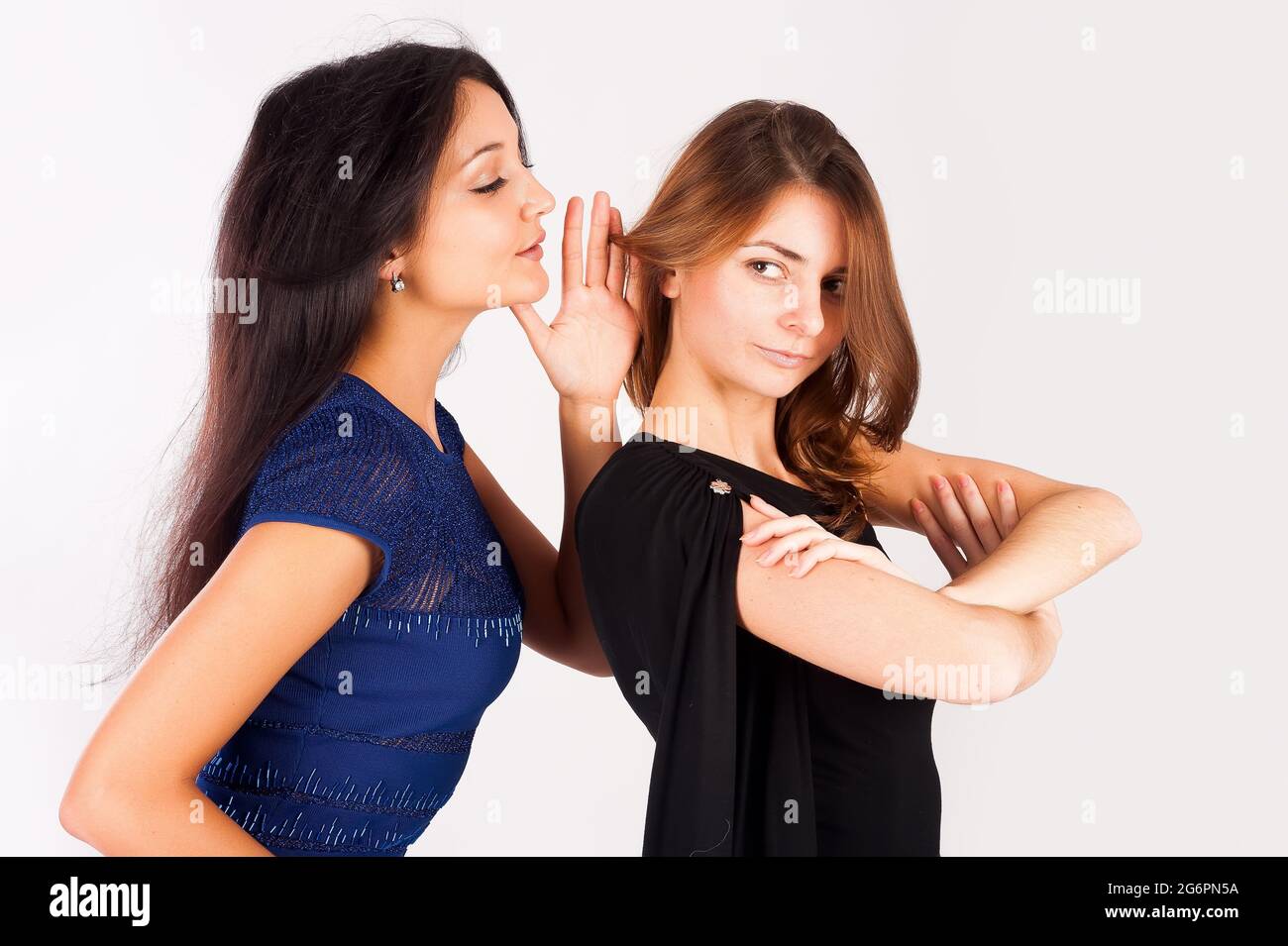 Two gossiping friends Stock Photo - Alamy