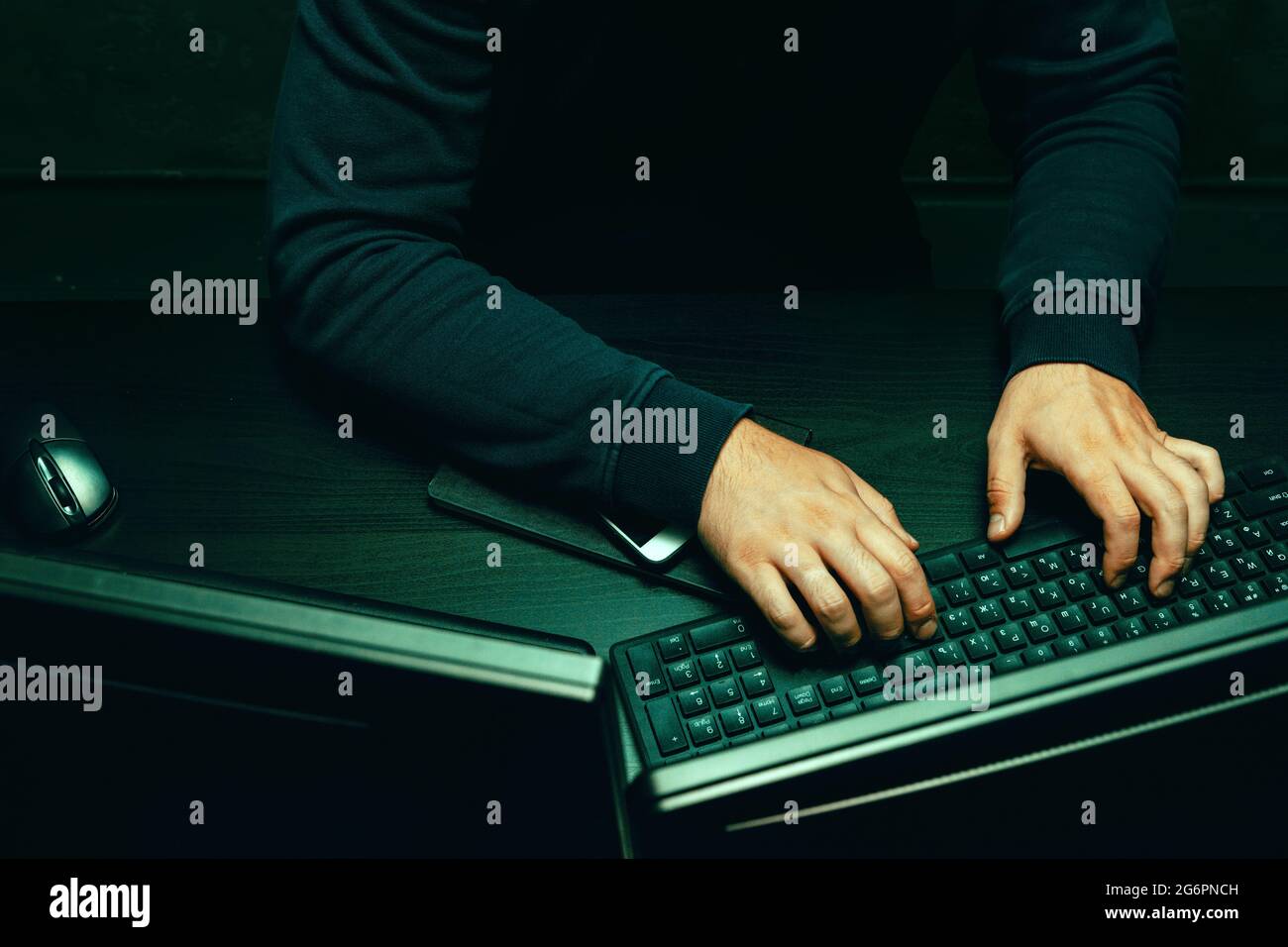 Close up of programmer of hacker hands typing a code Stock Photo - Alamy