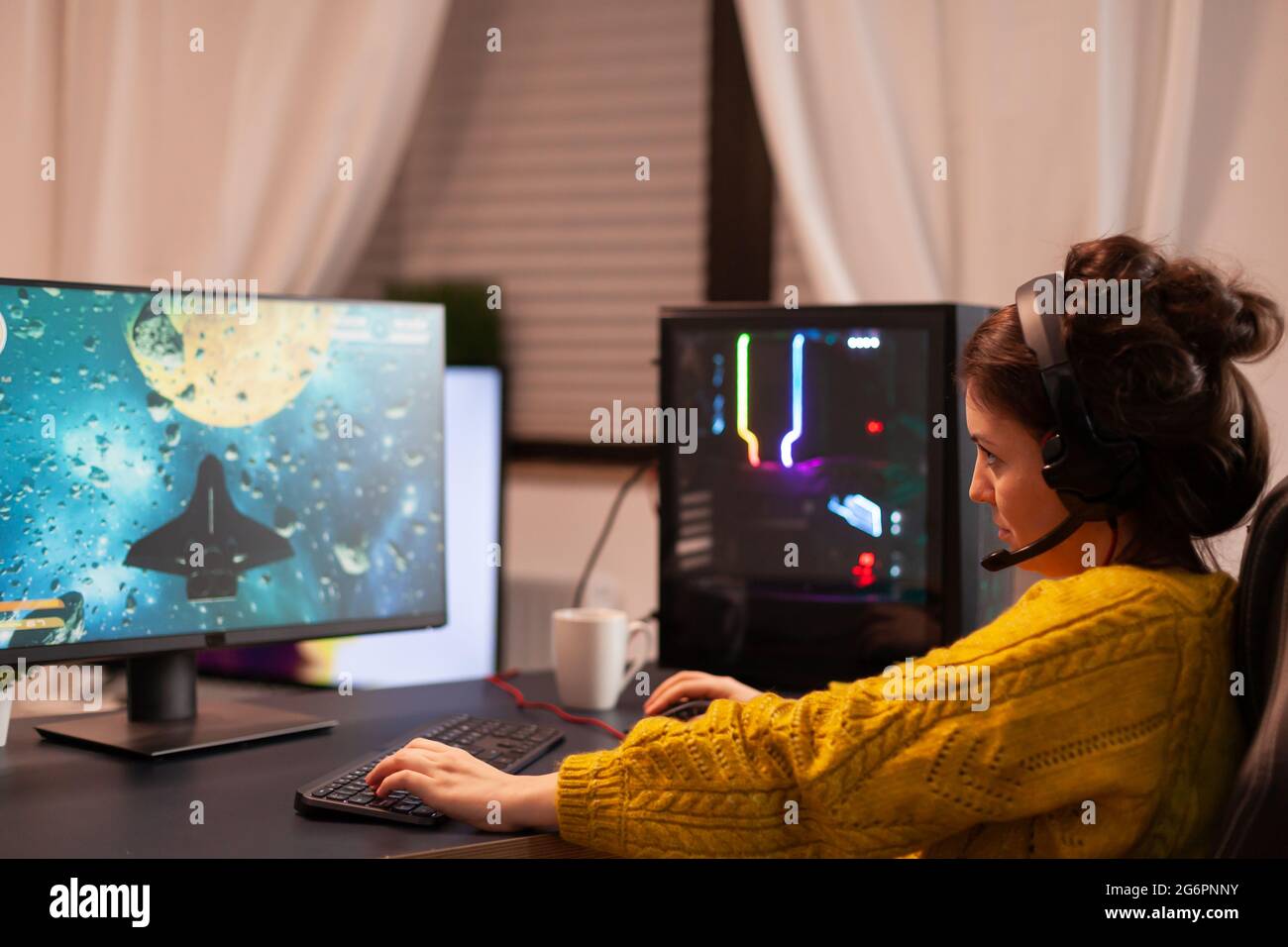 Professional eSport gamer playing in competitive video games on cyber ...