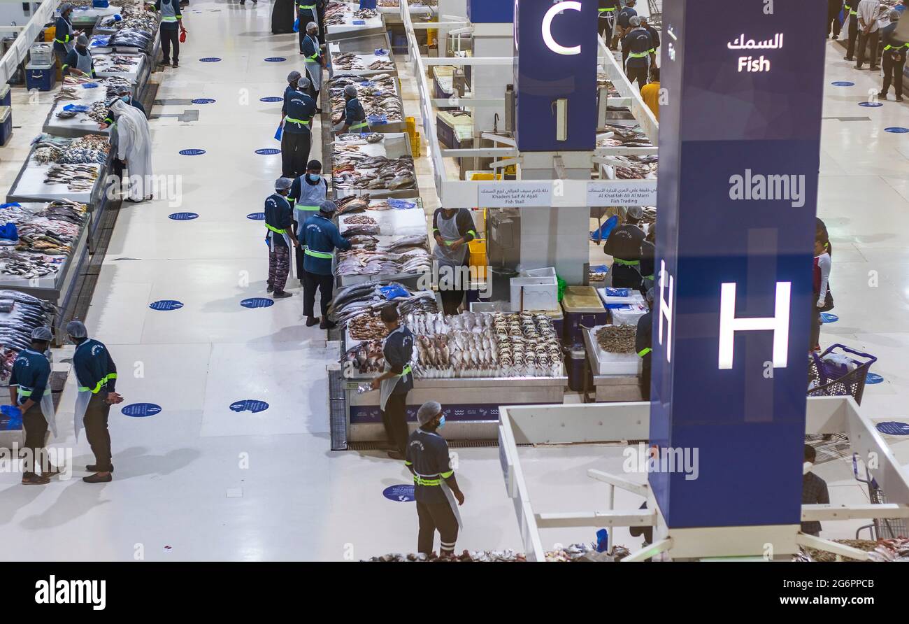 Dubai, UAE - 07.07.2021 - Customers and vendors at Waterfront market ...