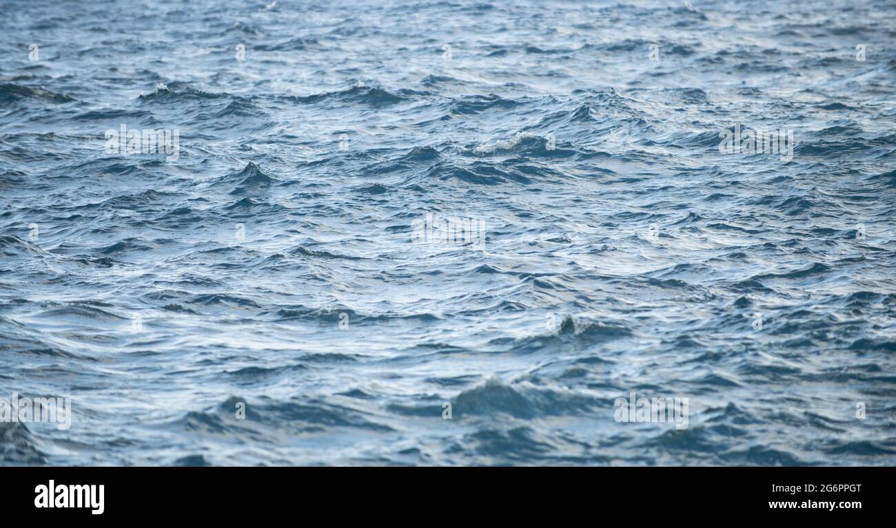 Calm sea water surface texture with splashes and waves. Abstract nature ...