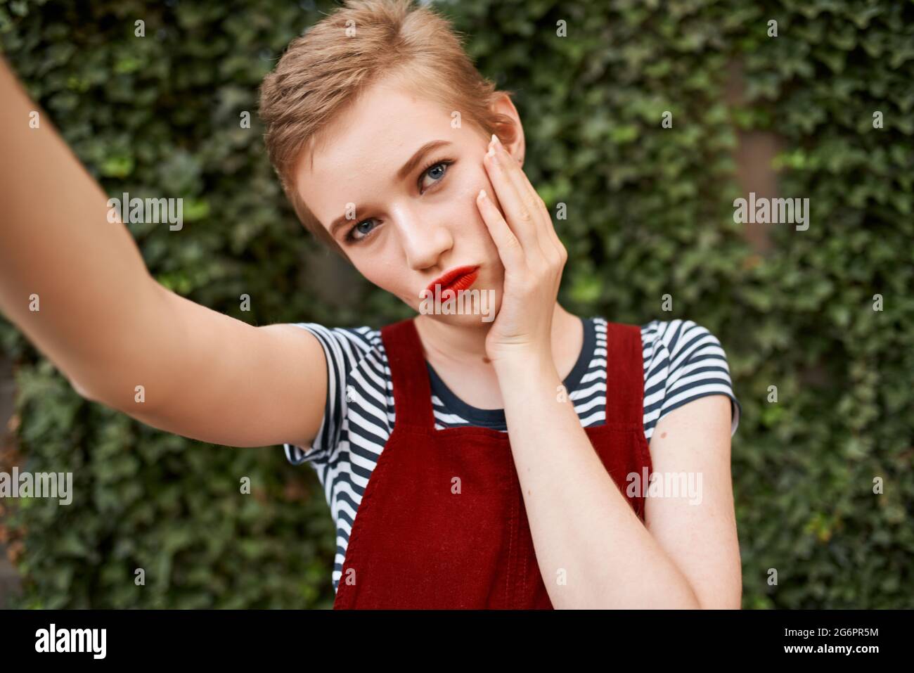 woman posing outdoors bush fresh air walk Stock Photo - Alamy