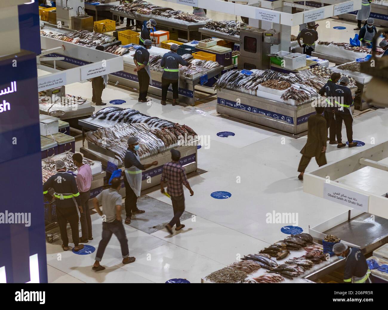 Dubai, UAE - 07.07.2021 - Customers and vendors at Waterfront market ...