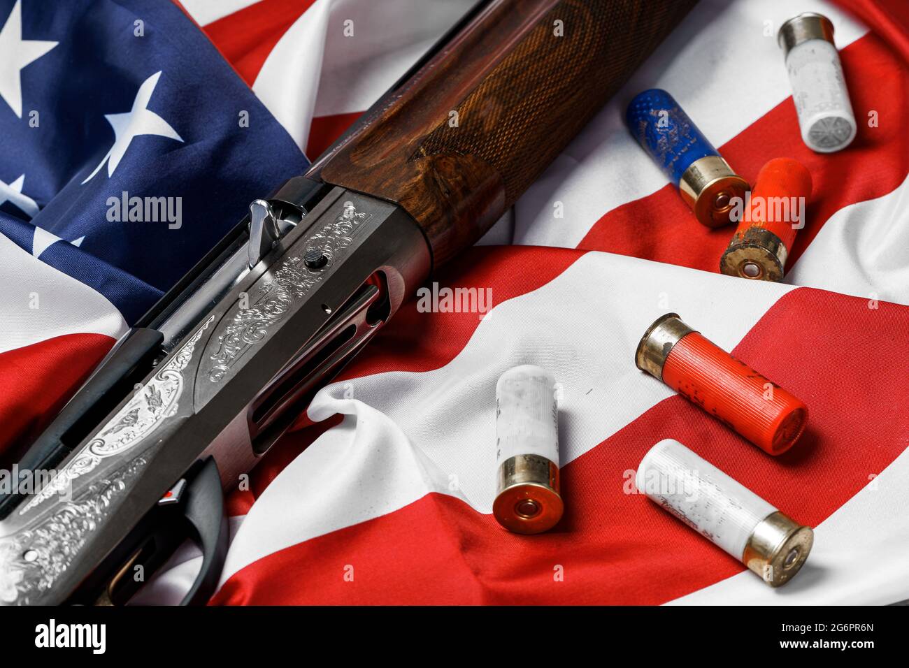 Automatic rifle on USA flag on wooden background Stock Photo - Alamy