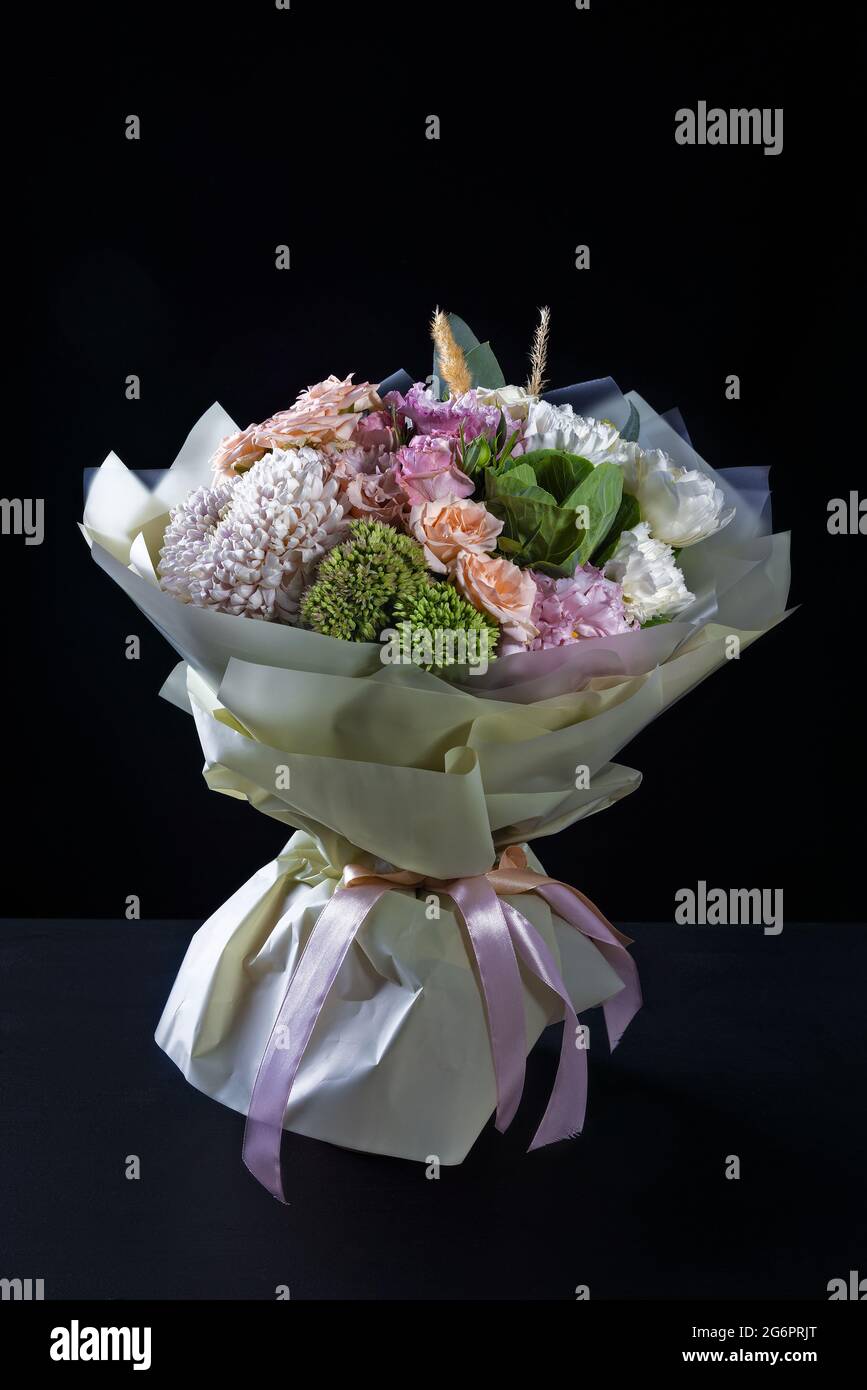 Bouquet of flowers isolated on black.Copy space Stock Photo - Alamy