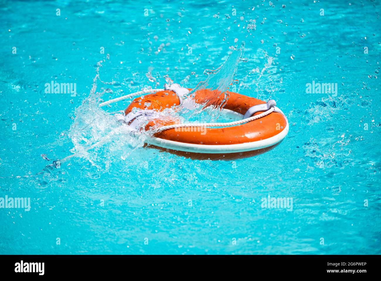 Lifebuoy on the water background. The concept of help, rescue, drowning ...