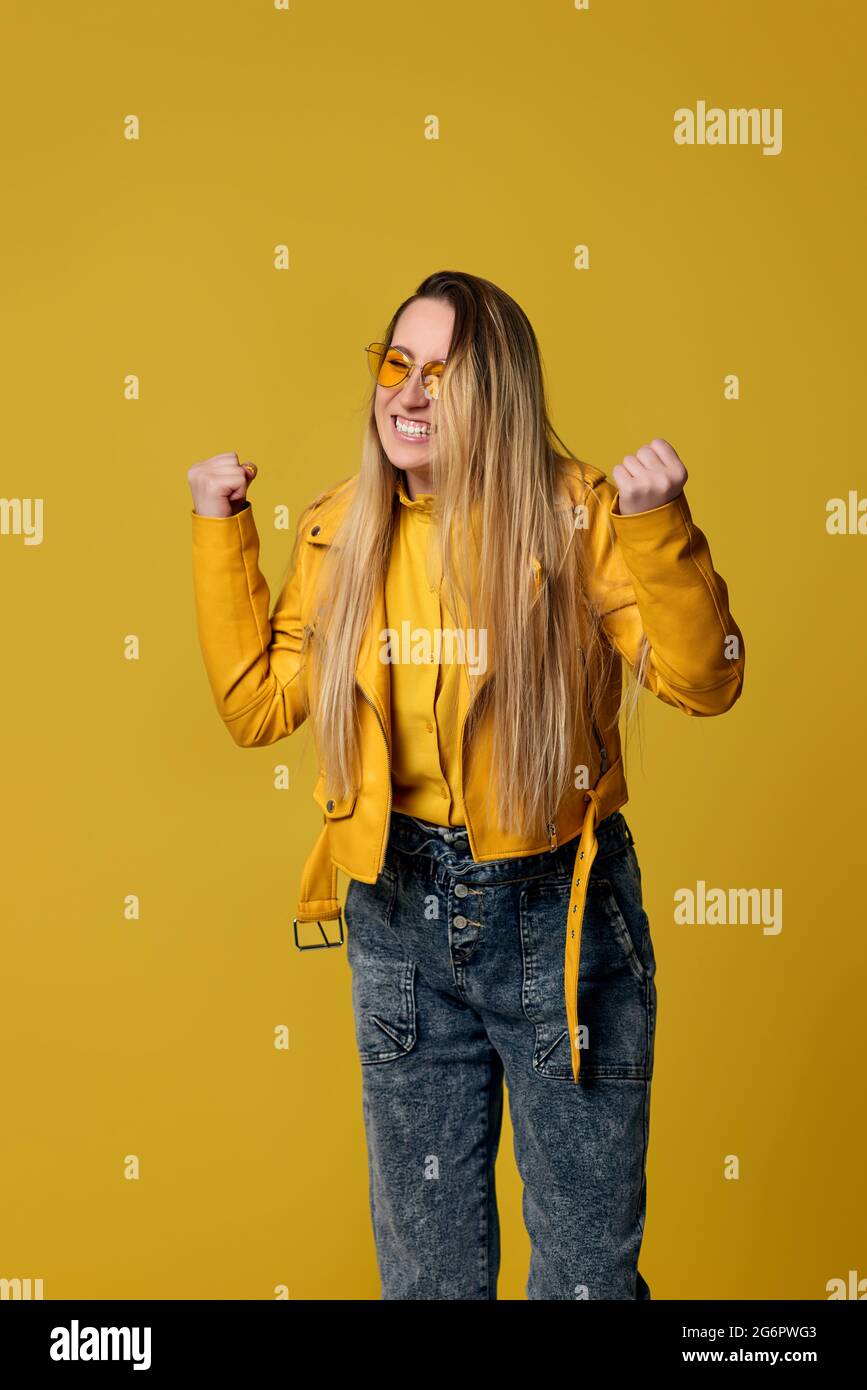 happy woman screaming on yellow background. Human emotions Stock Photo ...