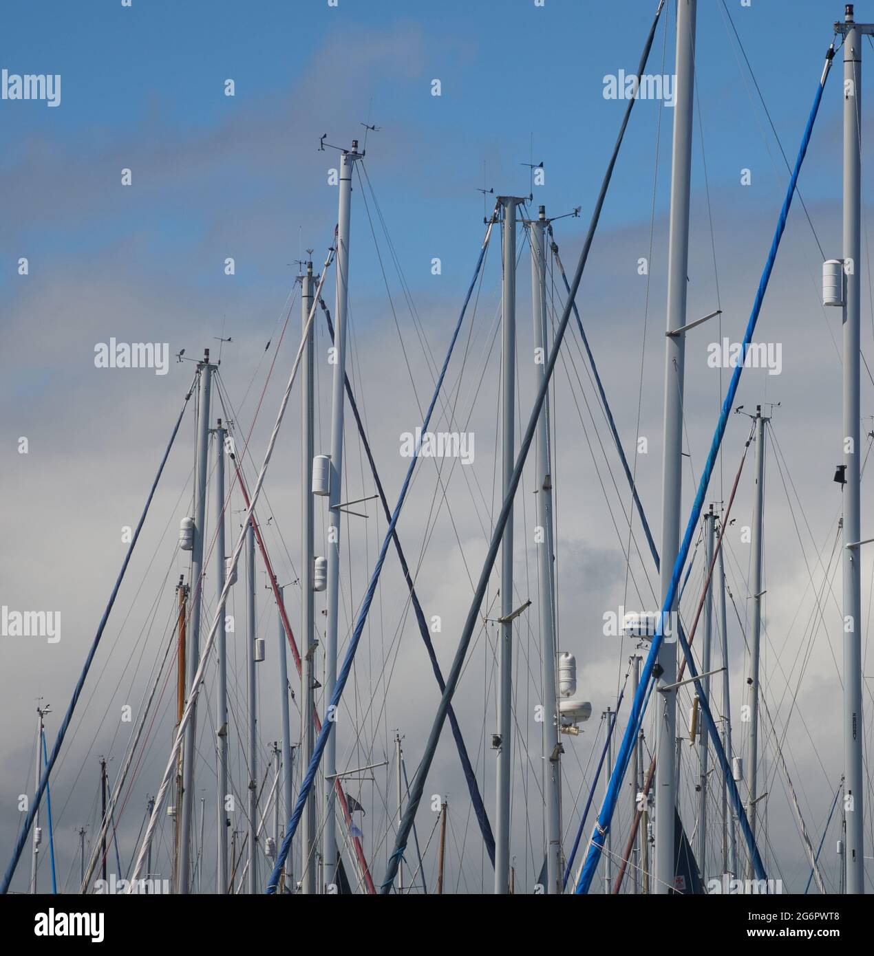 Close up of many masts of sailing boats Stock Photo - Alamy