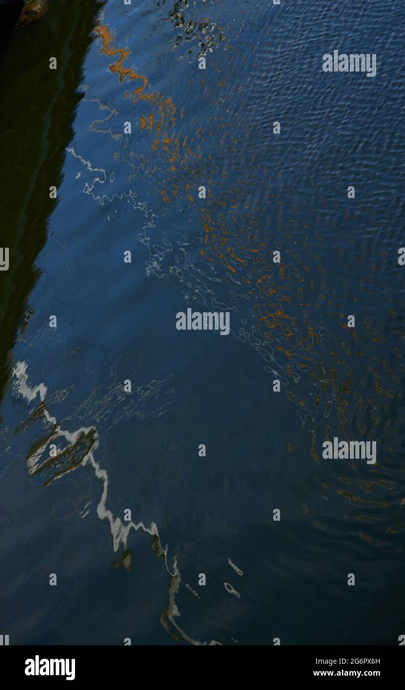 Reflections in water seen creating irregular patterns Stock Photo - Alamy