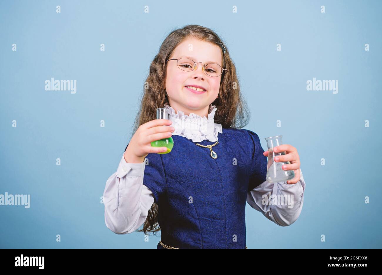 science research in lab. Small genius girl. child study bilogy lesson ...