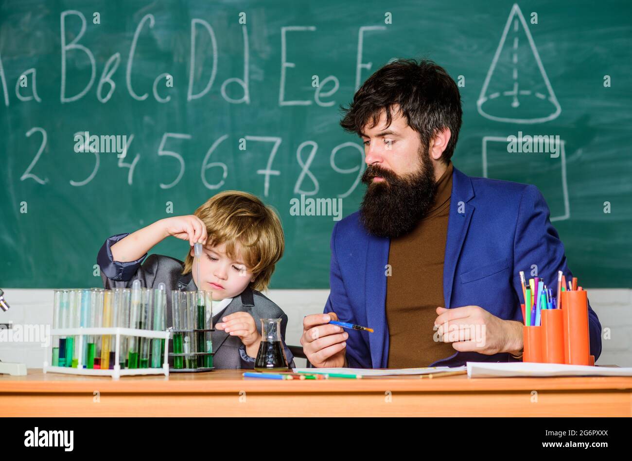 biotechnology research concept. Wisdom. Back to school. small boy with ...