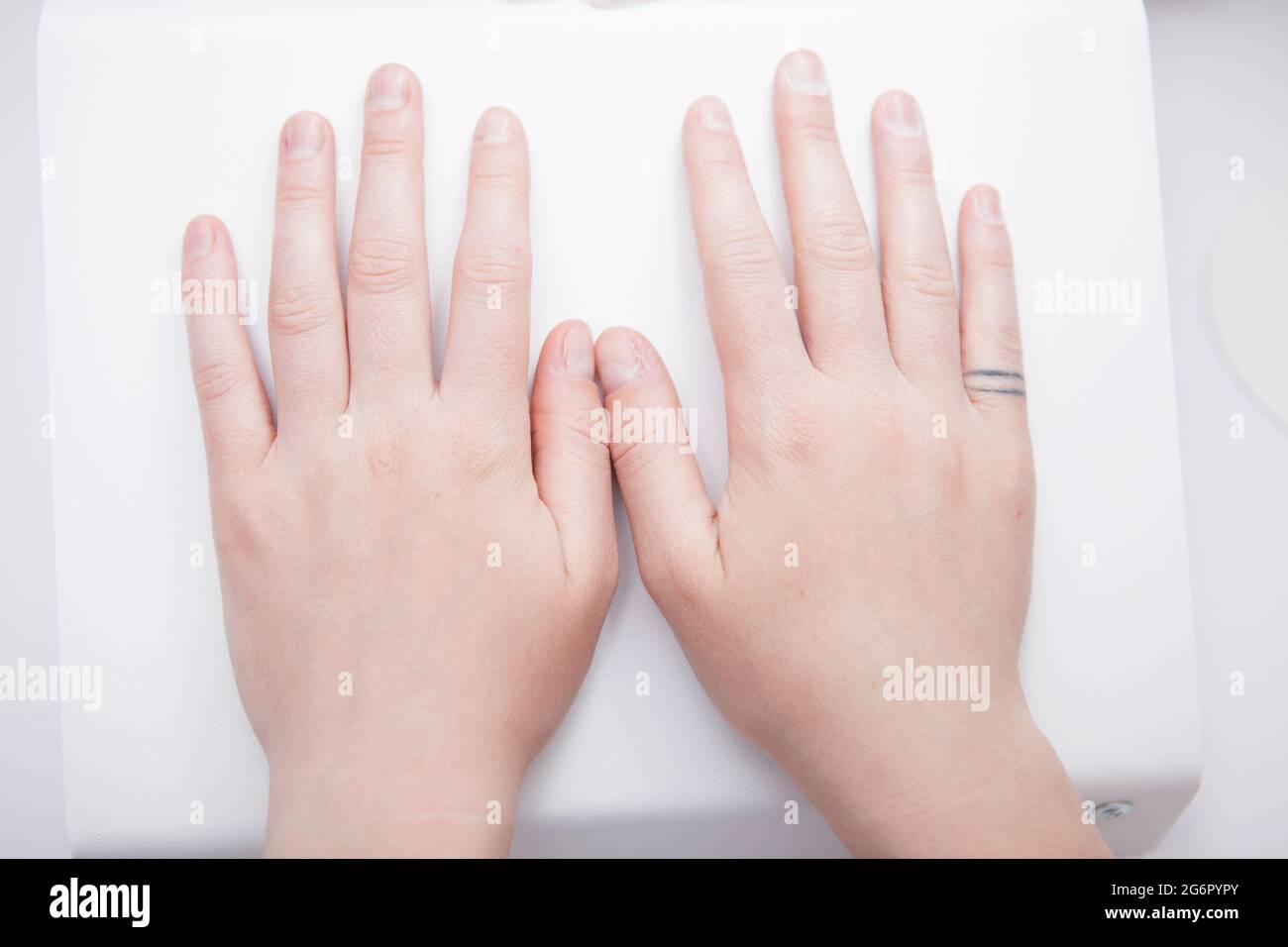 Moisturized hands hi-res stock photography and images - Alamy