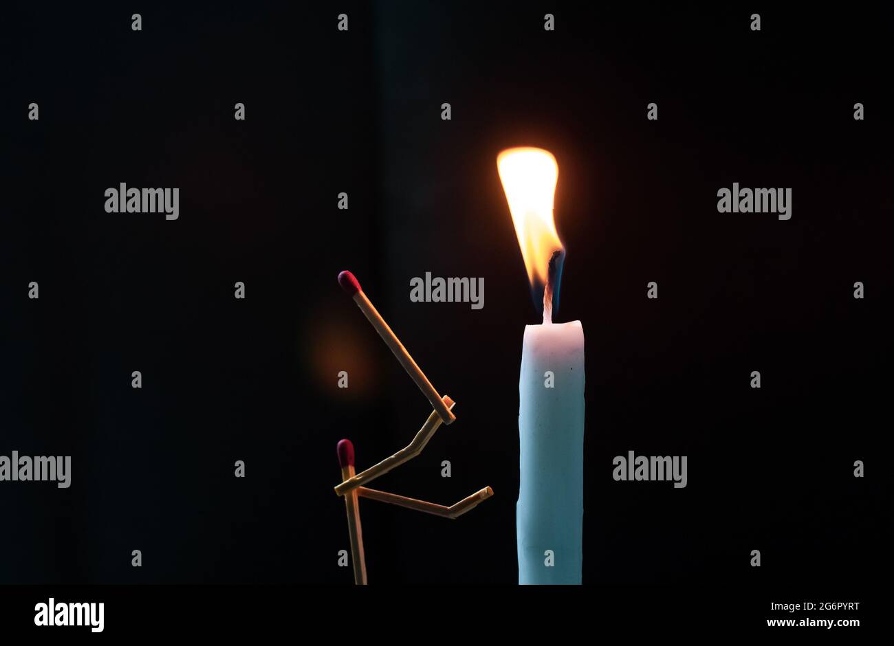Matchsticks in form of a man lighting a candle, matchstick man lighting ...