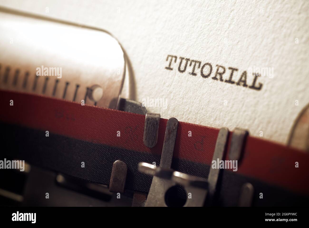 The word tutorial written with a typewriter Stock Photo - Alamy