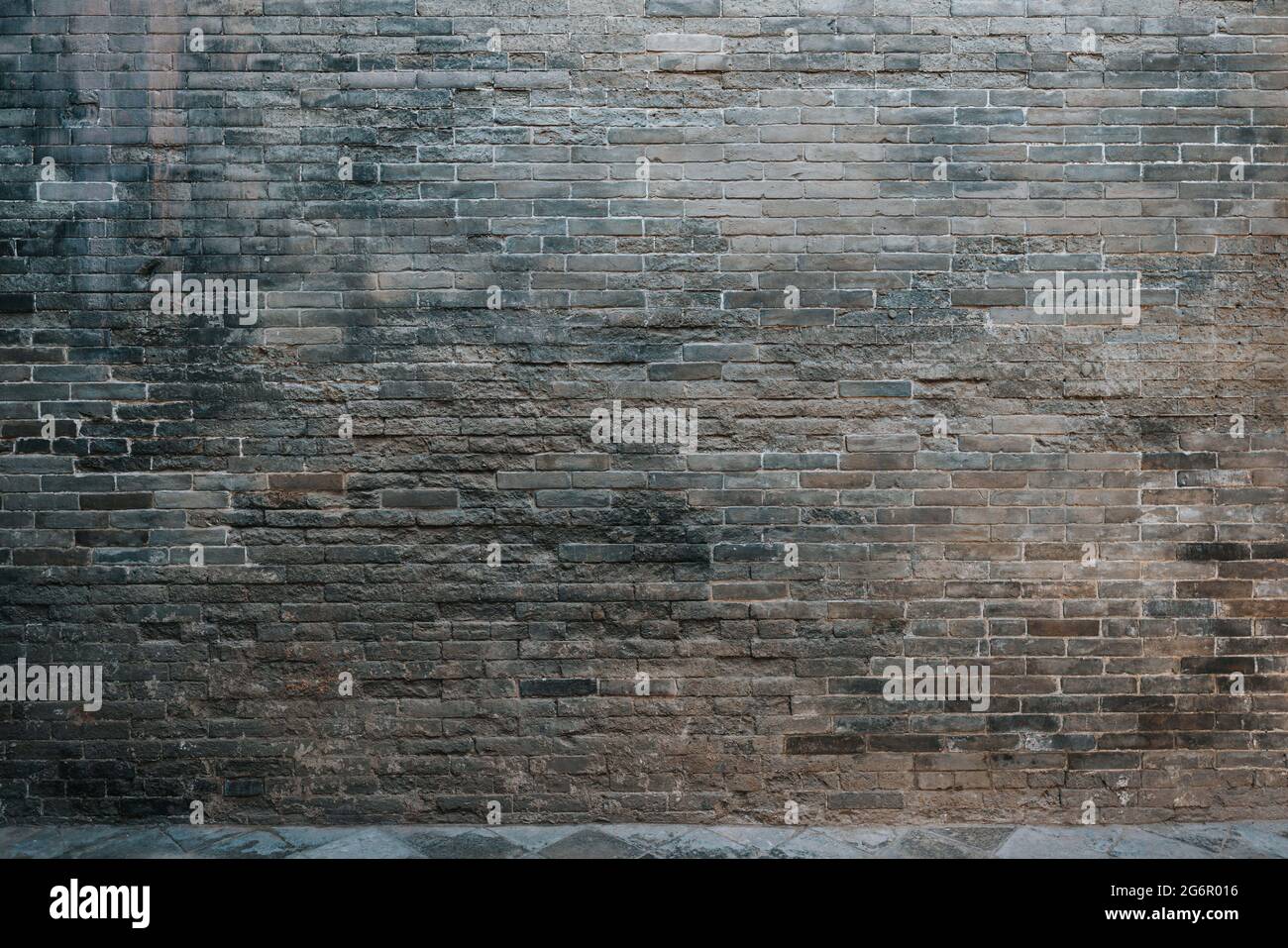 Chinese traditional building stone wall background Stock Photo - Alamy