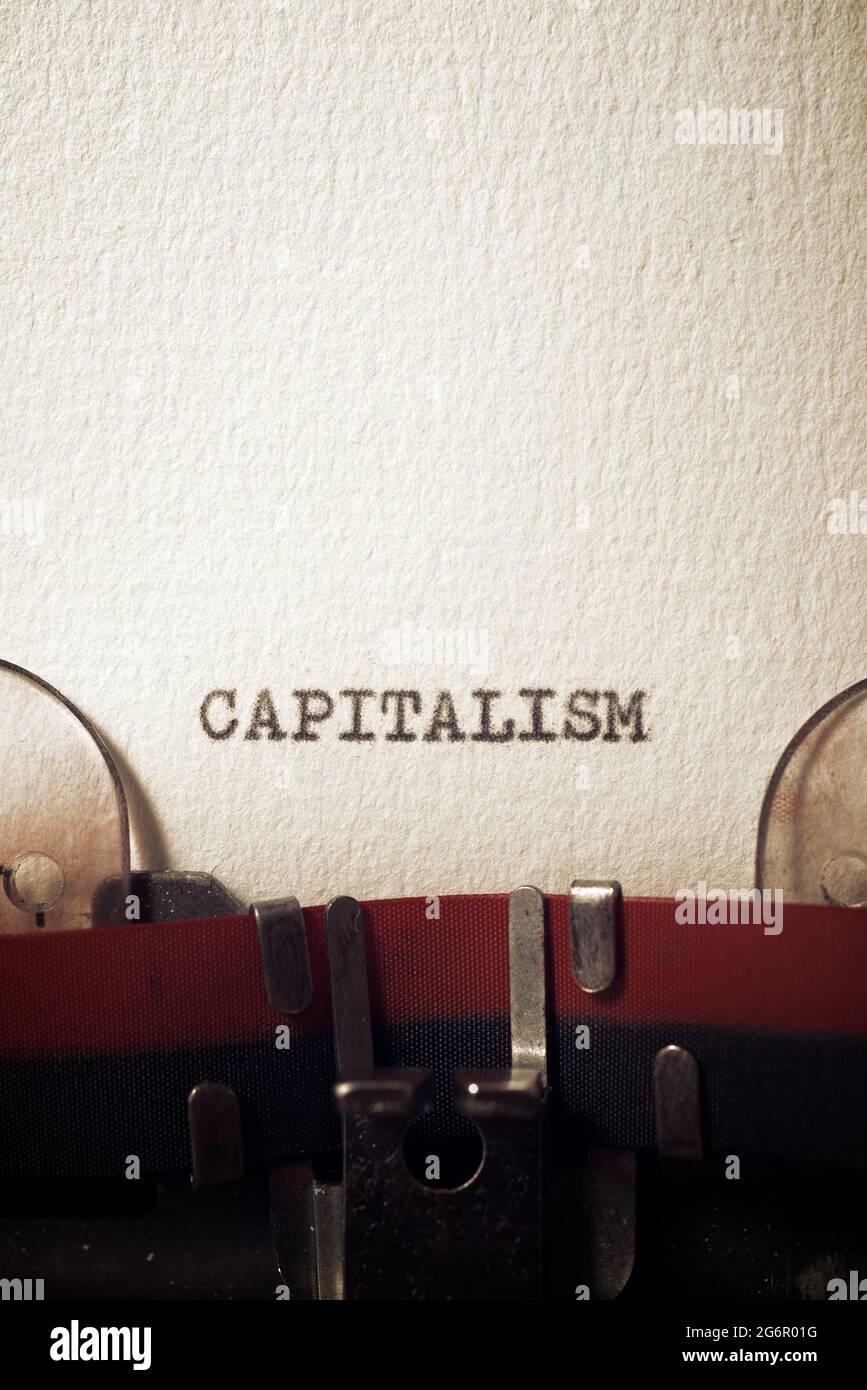 The word capitalism written with a typewriter Stock Photo - Alamy