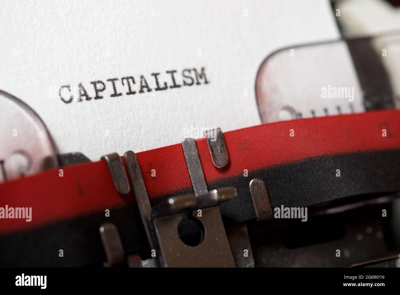 The word capitalism written with a typewriter Stock Photo - Alamy