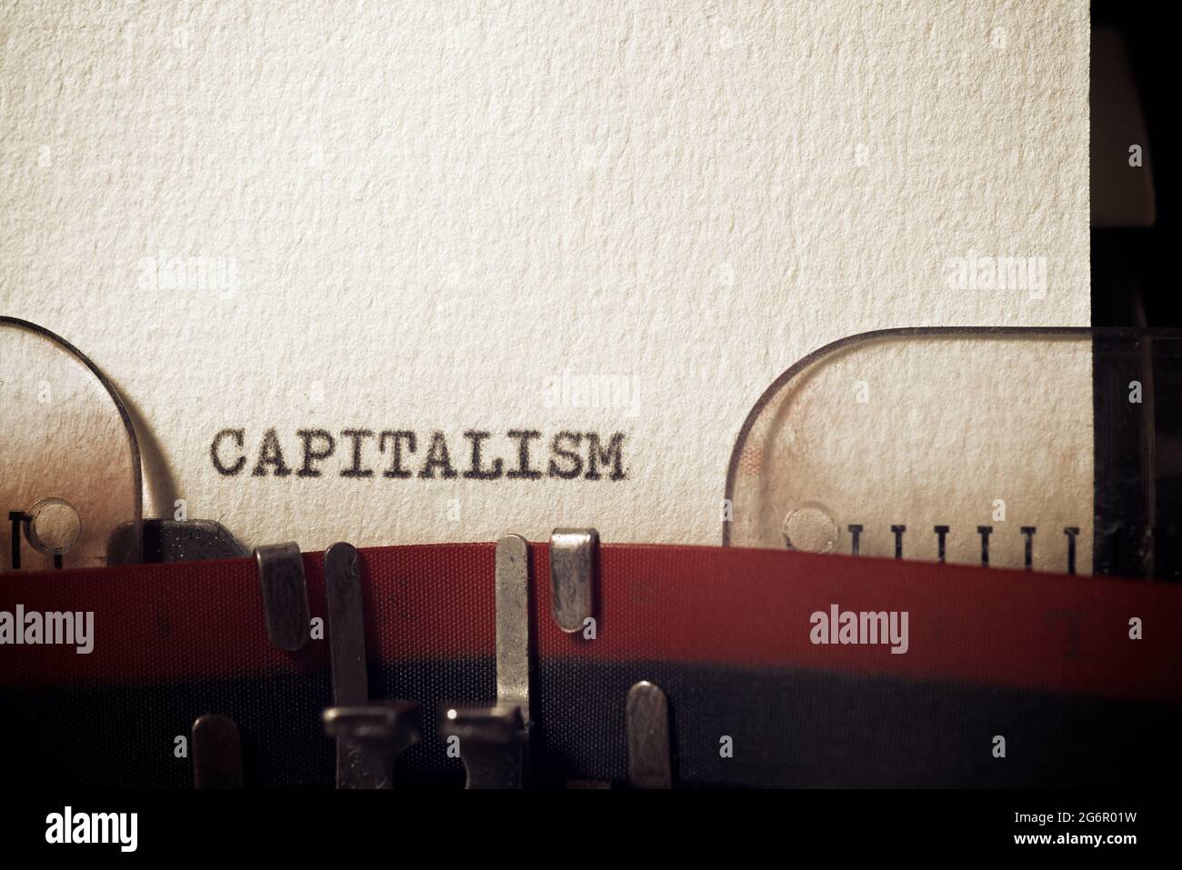 The word capitalism written with a typewriter Stock Photo - Alamy