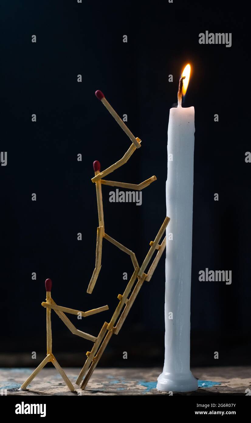 Matchsticks in form of a man lighting a candle, matchstick man lighting ...