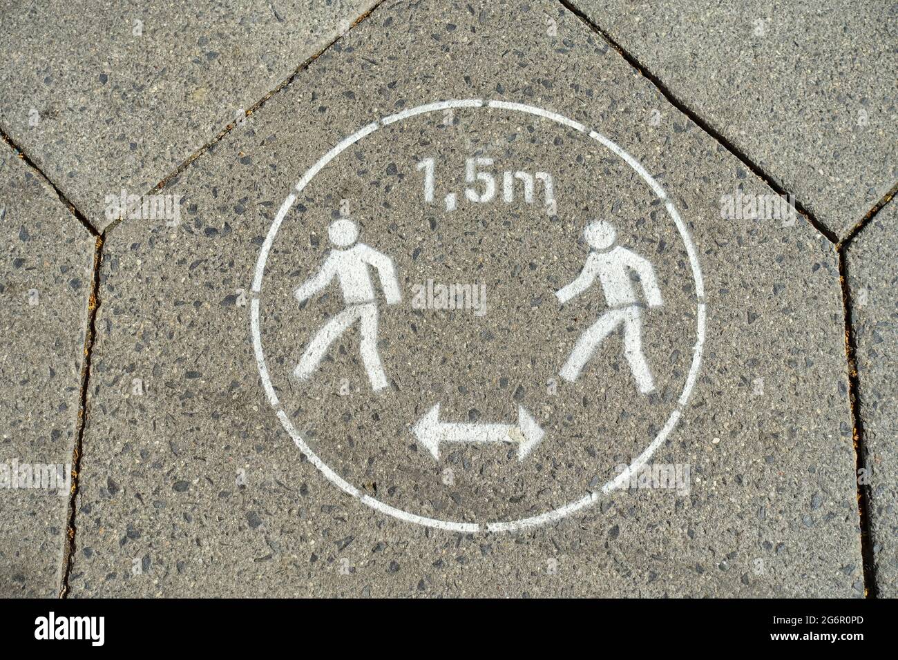 Keep distance, stencil on a pavement in Berlin, Germany Stock Photo - Alamy