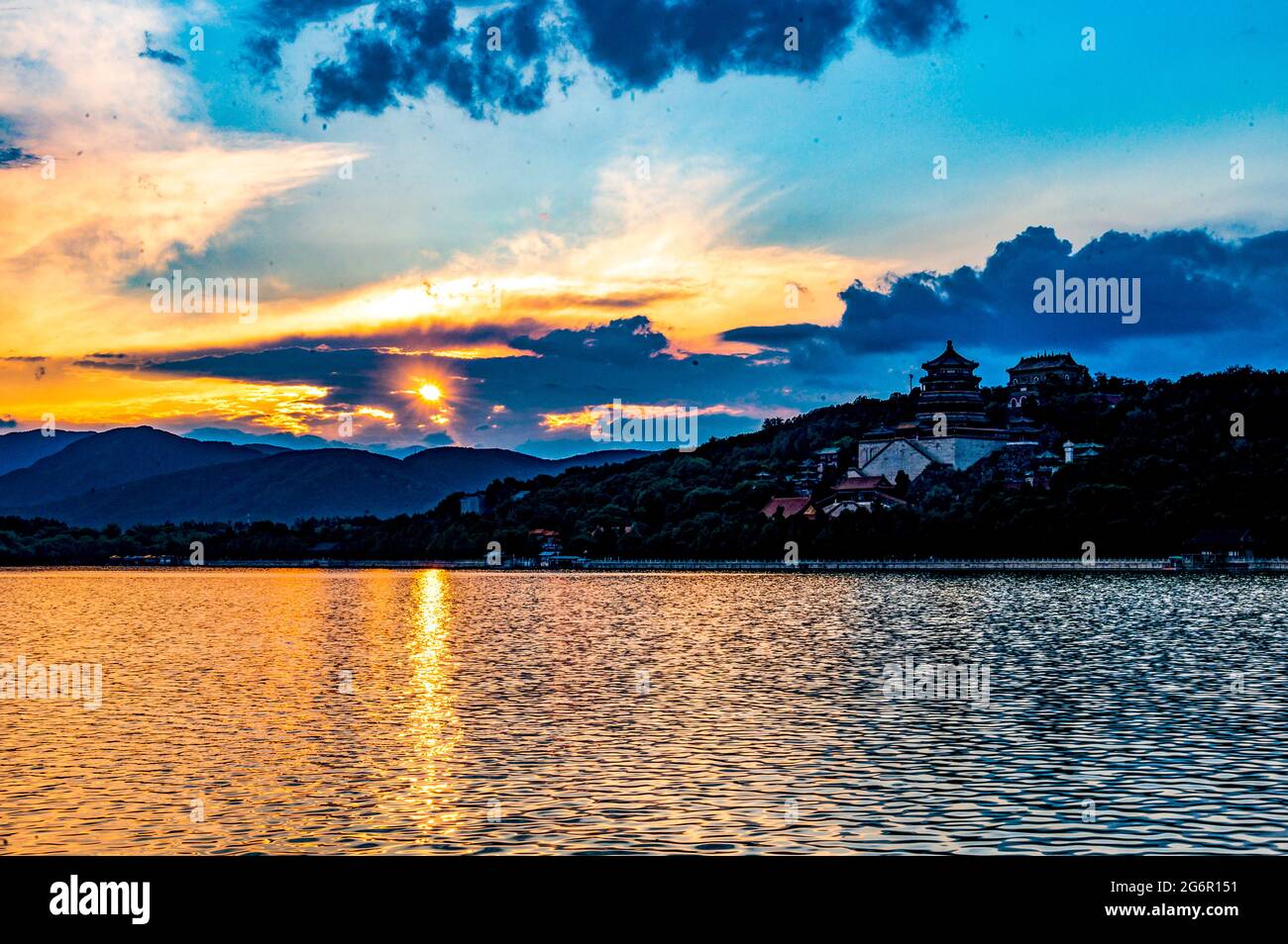 The Summer Palace attracts many visitors to take photos of the beautiful evening sunset after ...