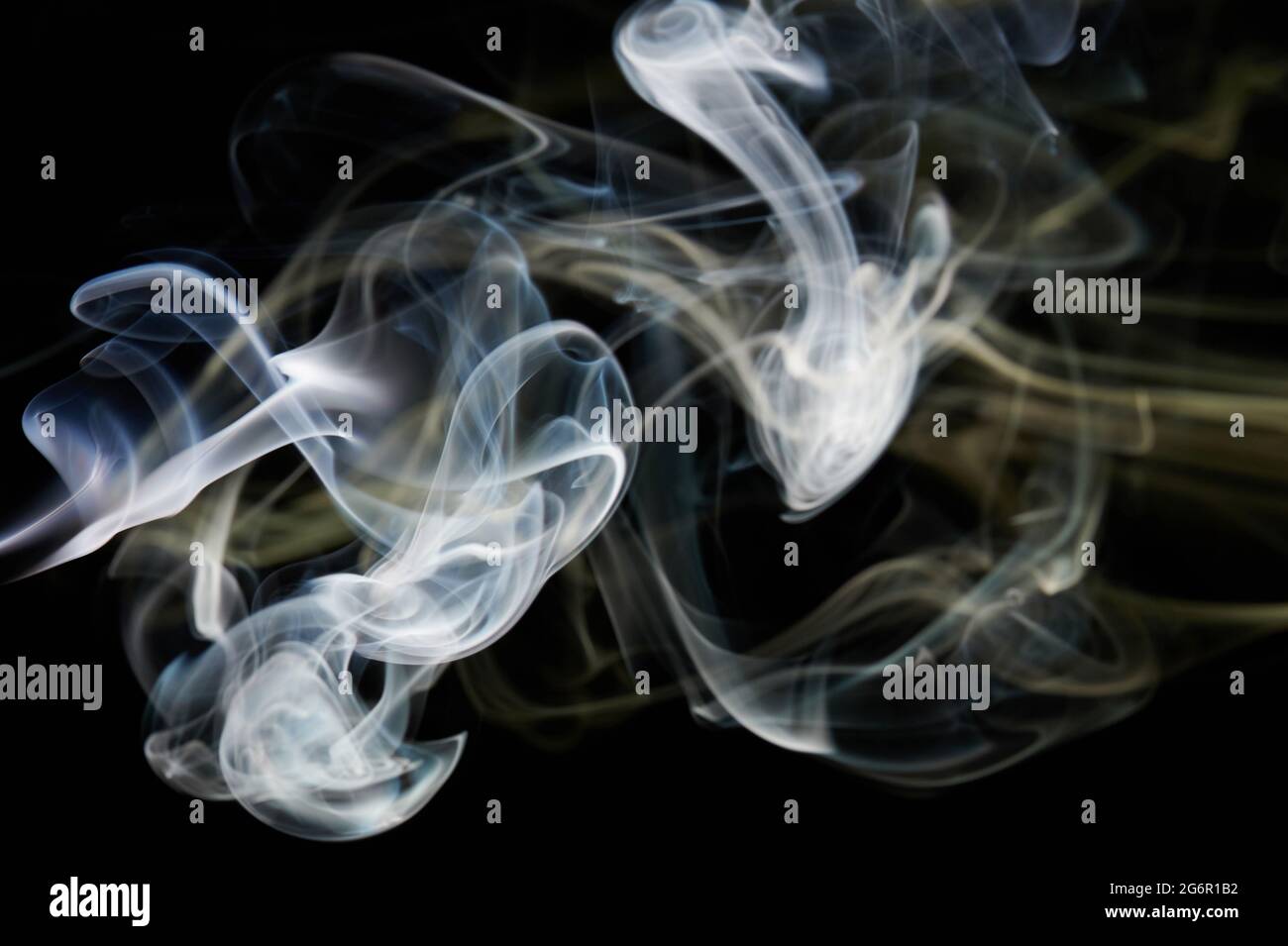 White abstract colorful smoke background with smooth shape in black ...