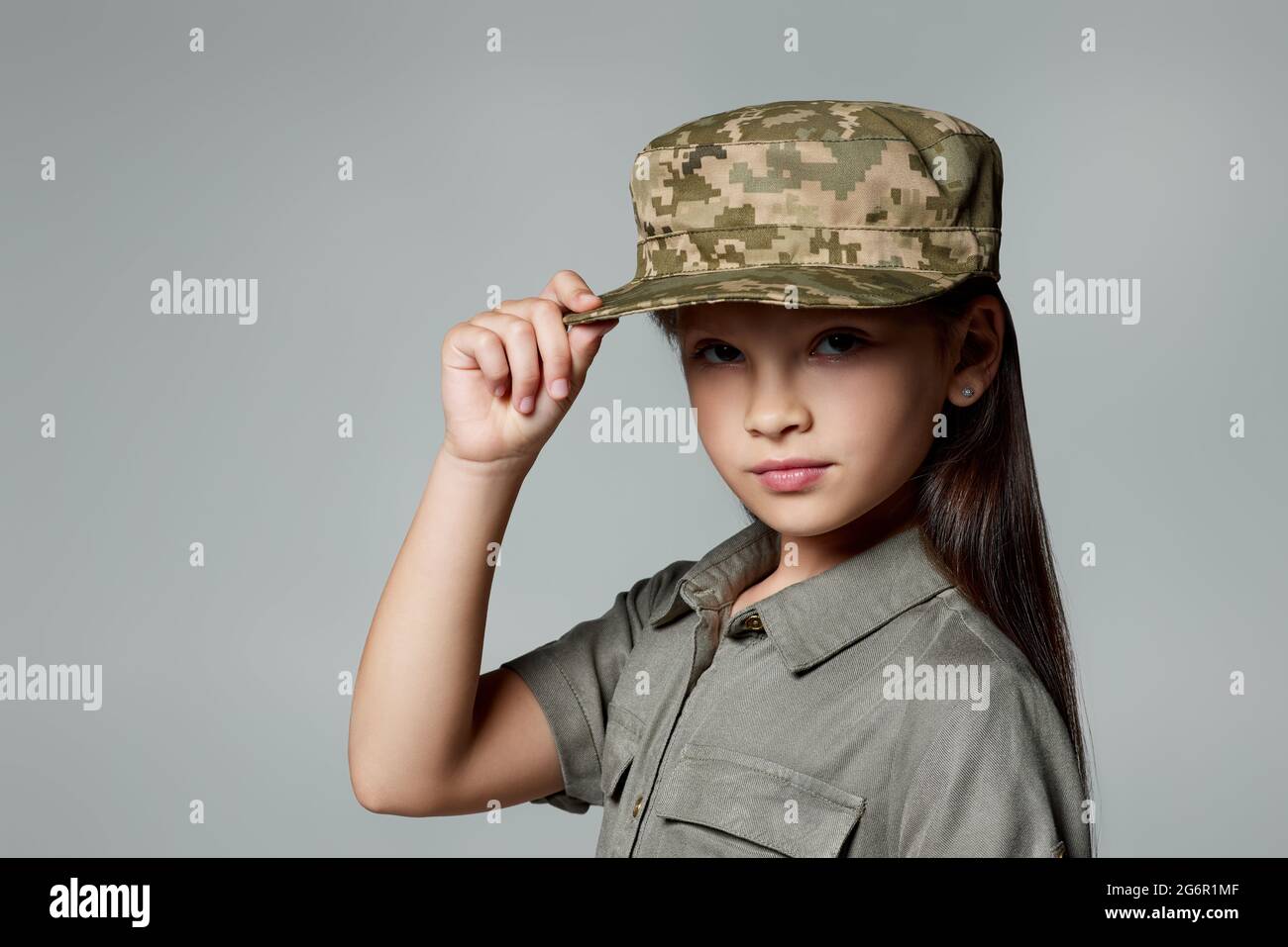 child girl wear military uniform. kid dressed like a soldier Stock ...