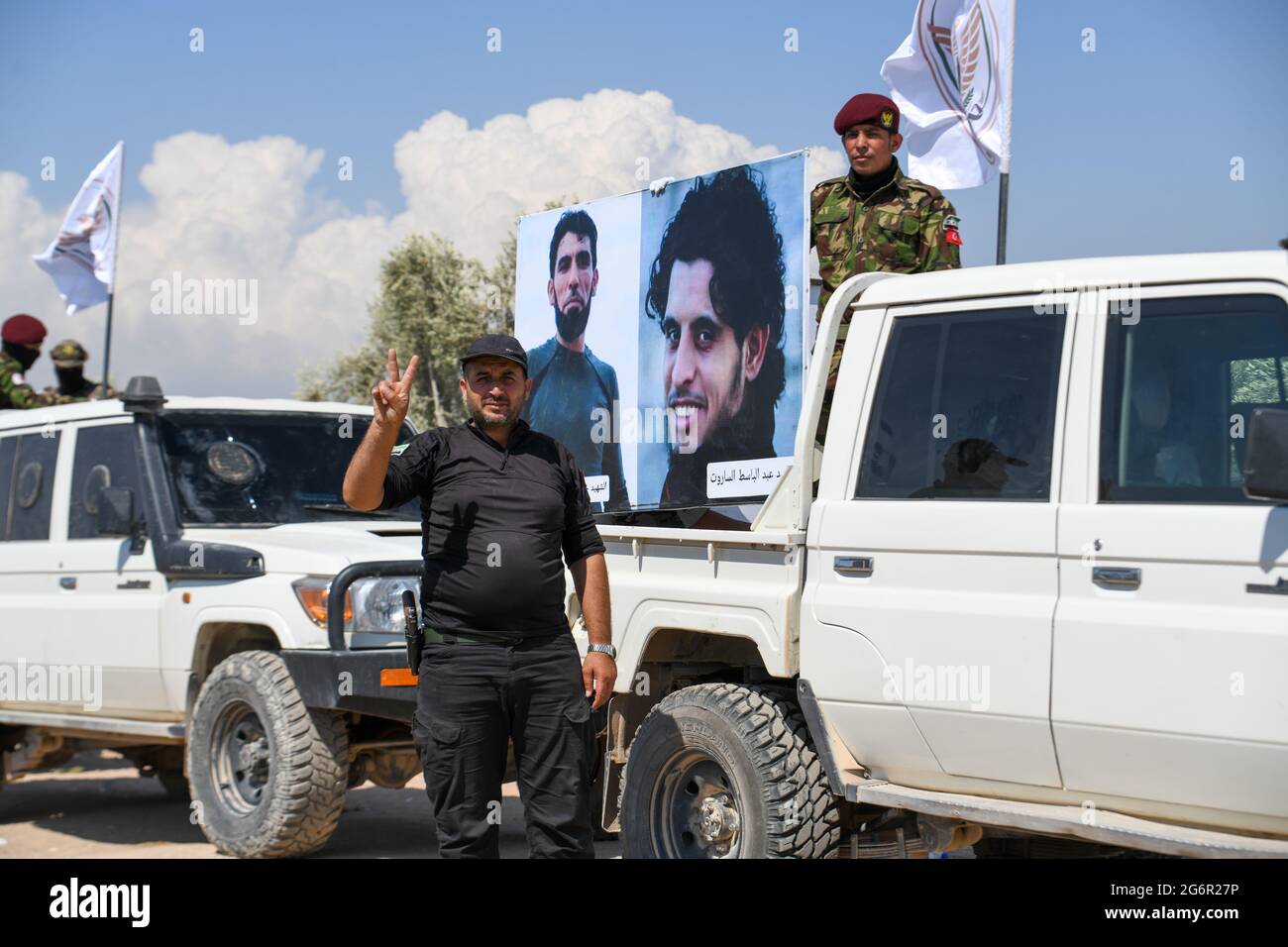 Sheikh Al-Hadid, Aleppo. Syria .July 6, 2021.Syrian fighters march in ...