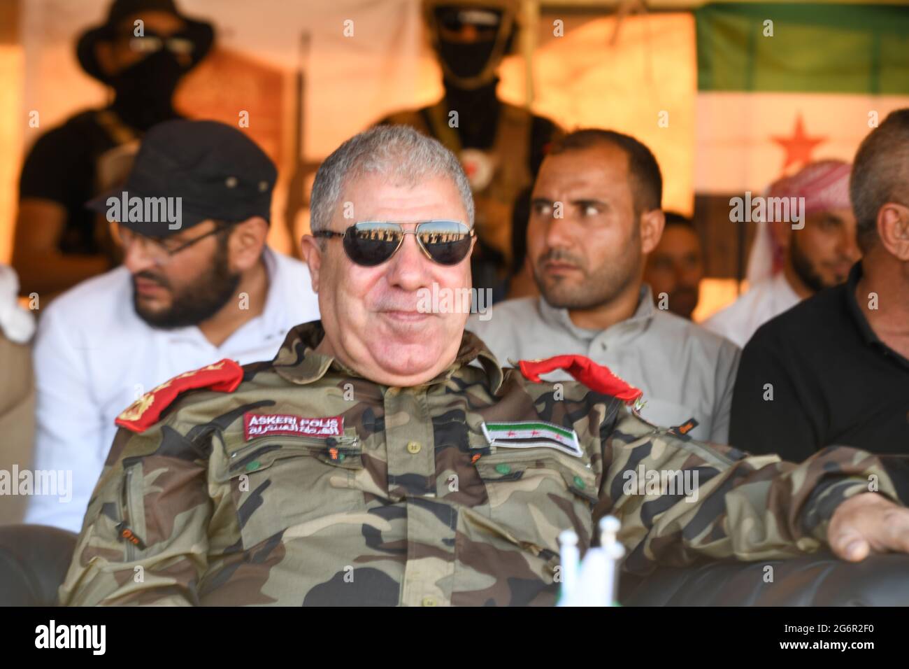 Sheikh Al-Hadid, Aleppo. Syria .July 6, 2021.Syrian fighters march in ...