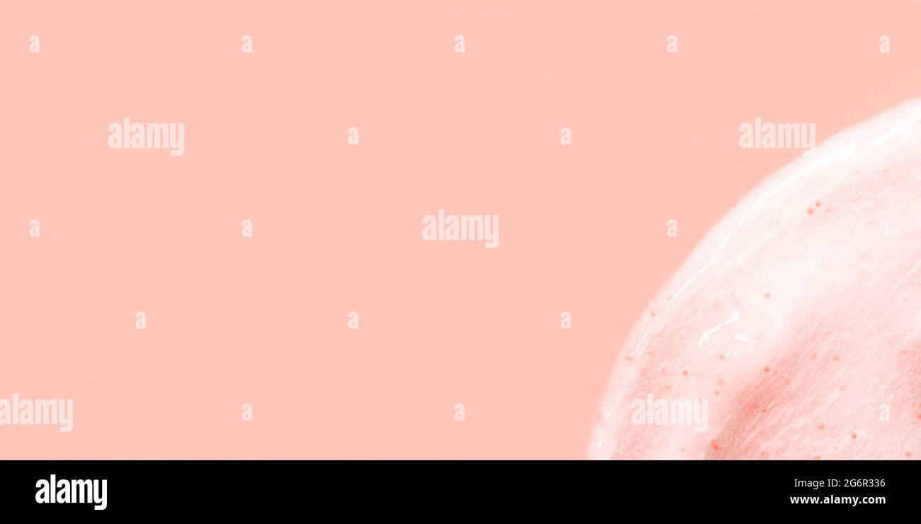 The texture of a scrub or shower gel on a pink background Stock Photo ...