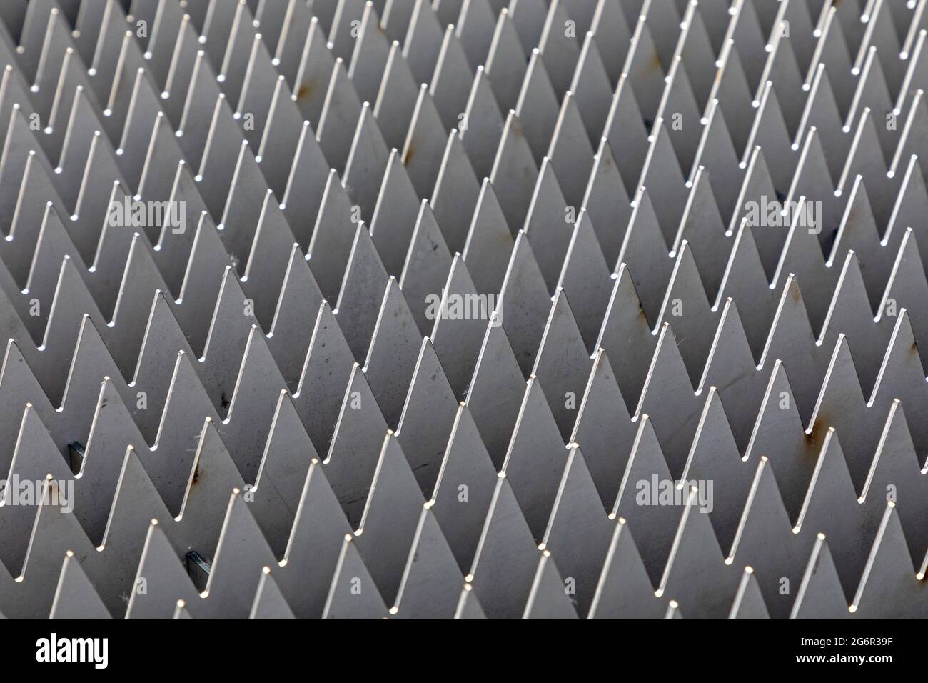 Spikes Surface at Cnc Machine Metal Workshop Stock Photo - Alamy