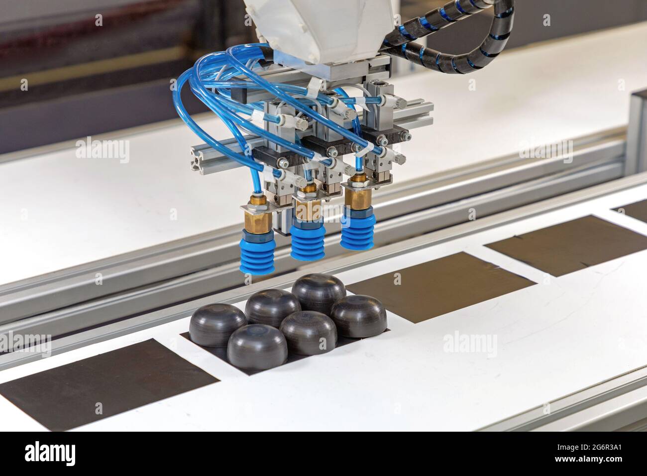 Automatic Arm With Vacuum Suction Picking at Conveyor Belt Stock Photo ...