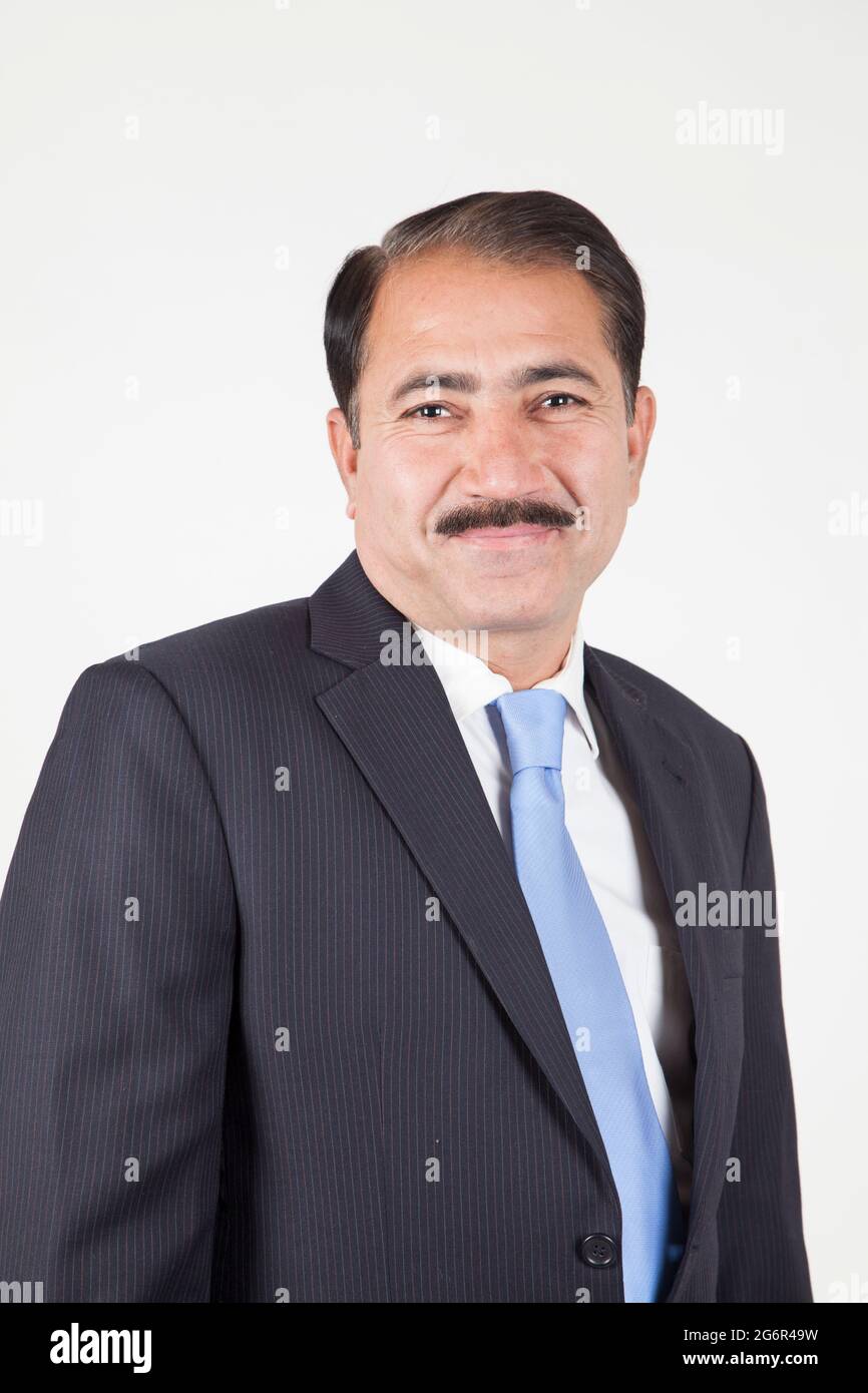 Mature senior company director CEO holding hand portrait Stock Photo ...